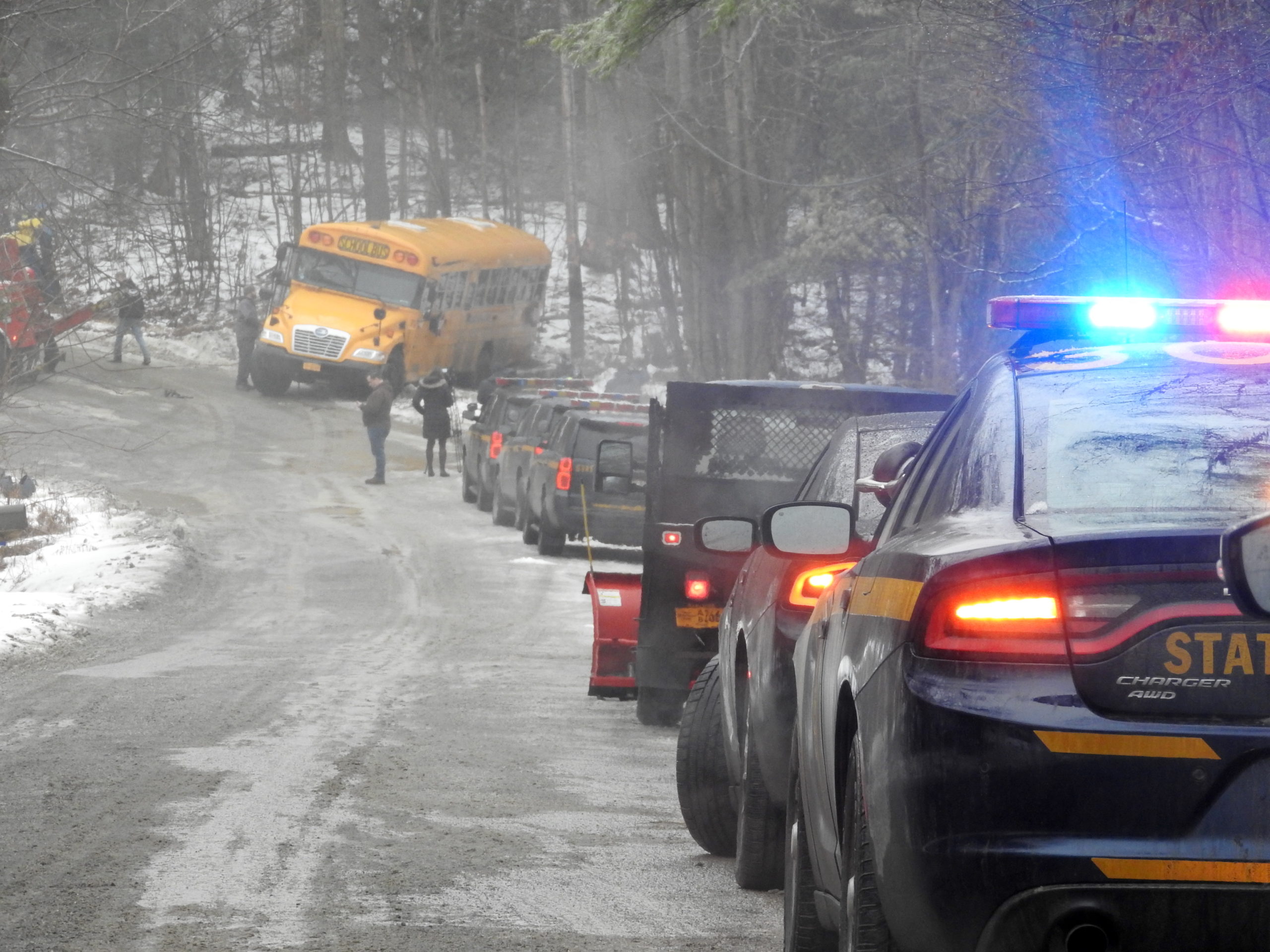 Bus rolls over on icy road in Candor; two students on bus - Owego ...